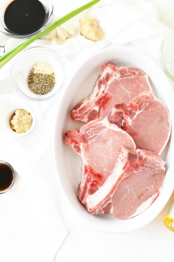 Grilled Asian Ginger Pork Chops - Sizzling Eats