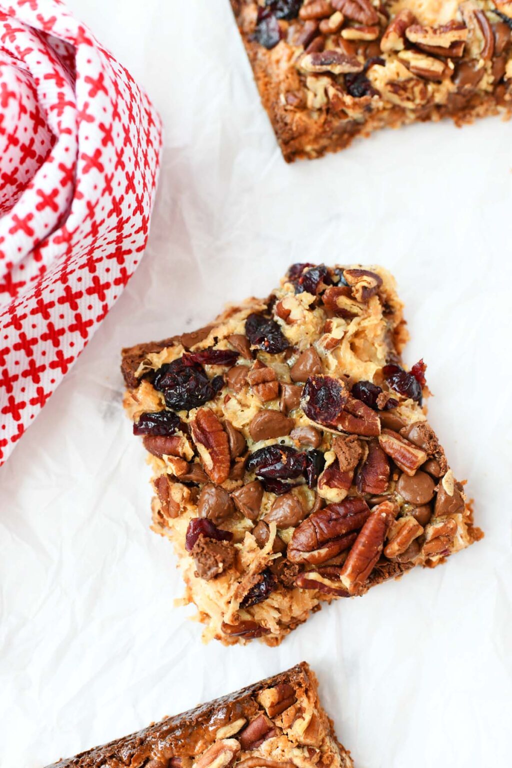 7 Layer Cranberry Magic Bars - Sizzling Eats