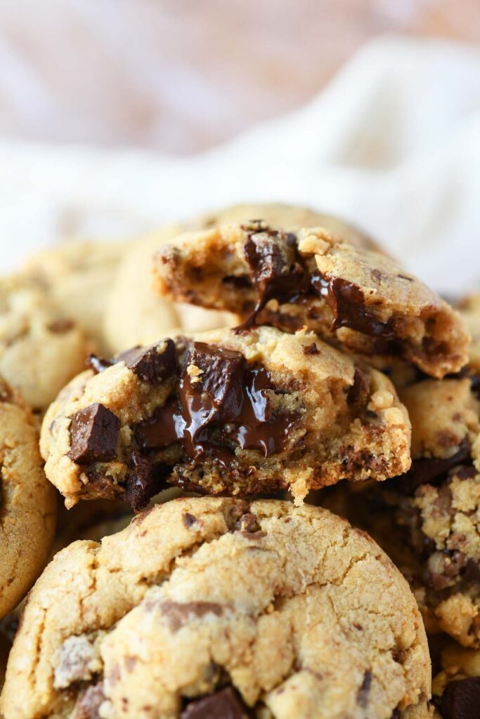 Thick Peanut Butter Cup Chocolate Chunk Cookies - Sizzling Eats